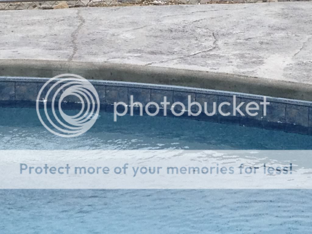 Installing safety line anchor in cantilever edge | Trouble Free Pool